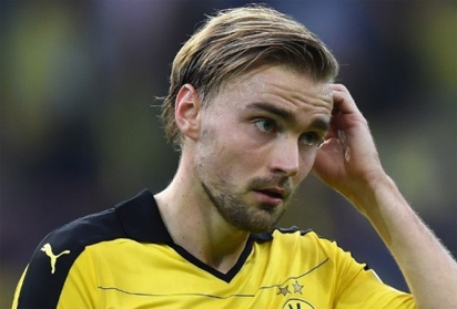 Dortmund captain Schmelzer out of Spurs clash - Vanguard News