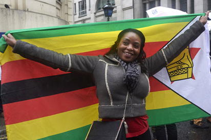 Zimbabweans gather in London to protest against Mugabe - Vanguard News