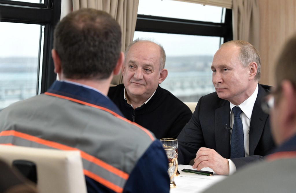 Putin takes first train across Crimea bridge - Vanguard News