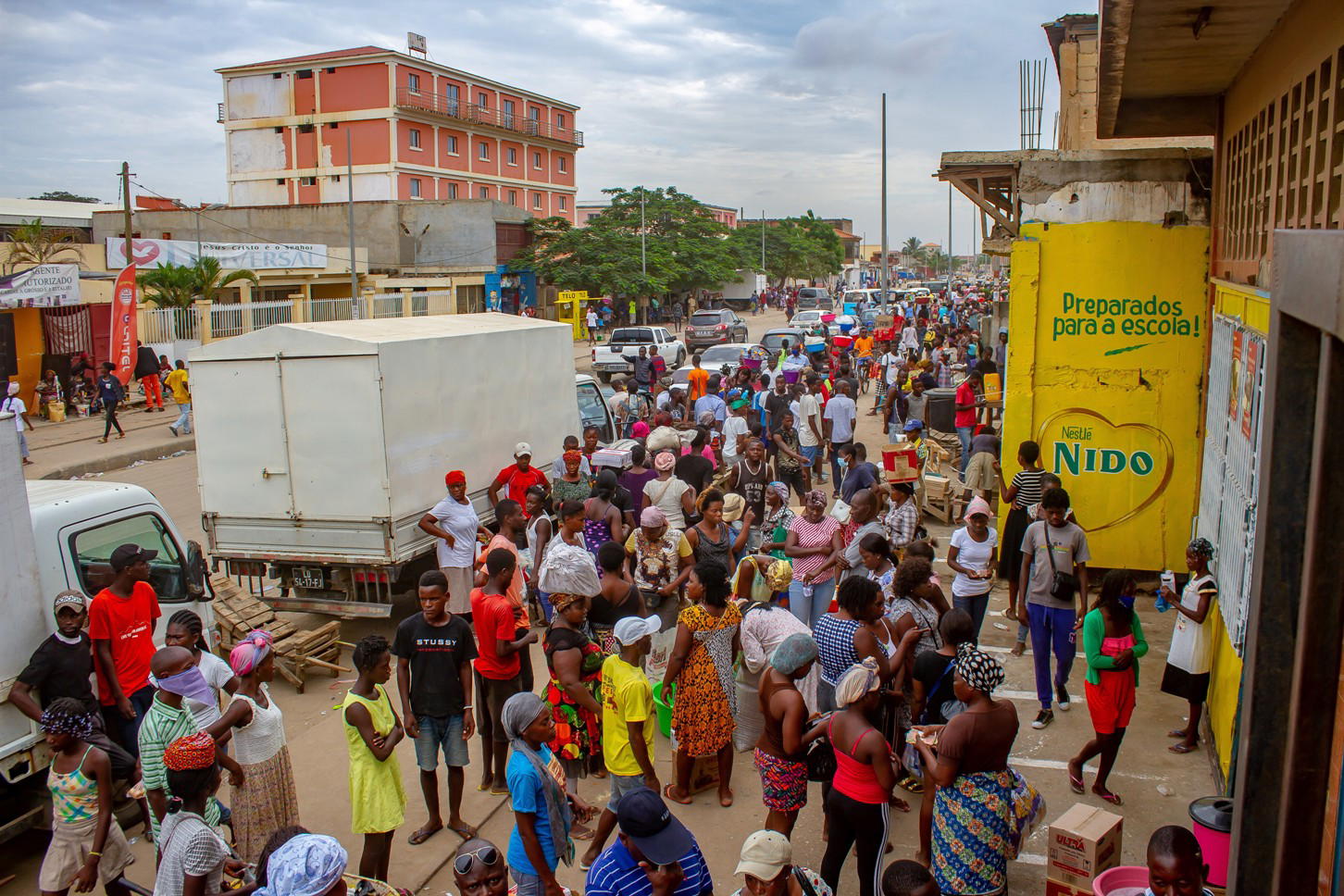 'Better die of this disease than starve': Angolans defy virus lockdown