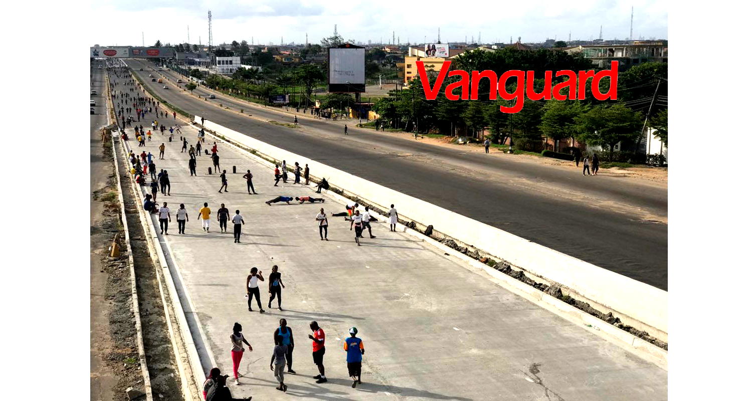 Lagosians on Gbagada expressway keeping fit amidst lockdown