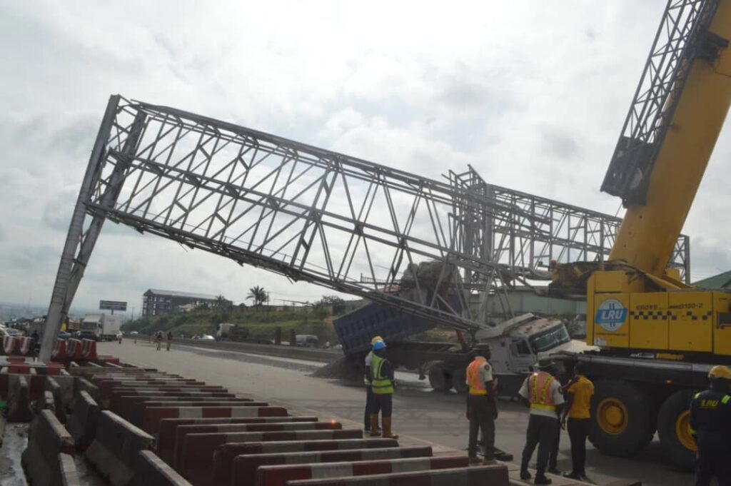 PHOTOS: Truck collides with signpost along Lagos-Ibadan expressway