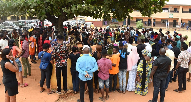 Photos: Nigerians troop out for PVCs - Vanguard News