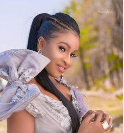 Mary Igwe's 'Girl Next Door' posture