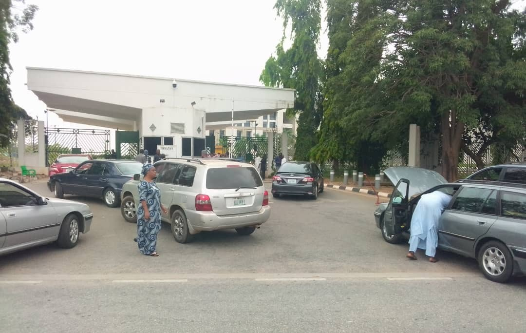 Photos: NASS complex gate locked, staff stranded as NLC strike enters ...