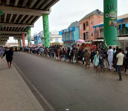 Photos: Passengers groan as fuel scarcity, long queues hit Lagos, Abuja, Kwara, Osun - Vanguard News