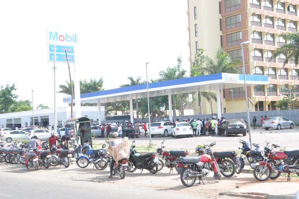 Photos: Passengers groan as fuel scarcity, long queues hit Lagos, Abuja, Kwara, Osun - Vanguard News