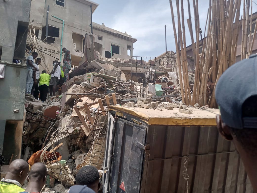 Photos: Many trapped as two-storey building collapses in Lagos Island ...