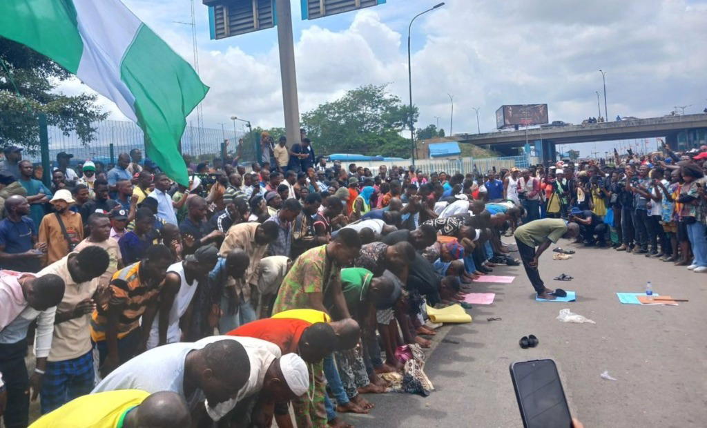 Photos: Christians stand guard for Muslims observing prayers in Ojota ...