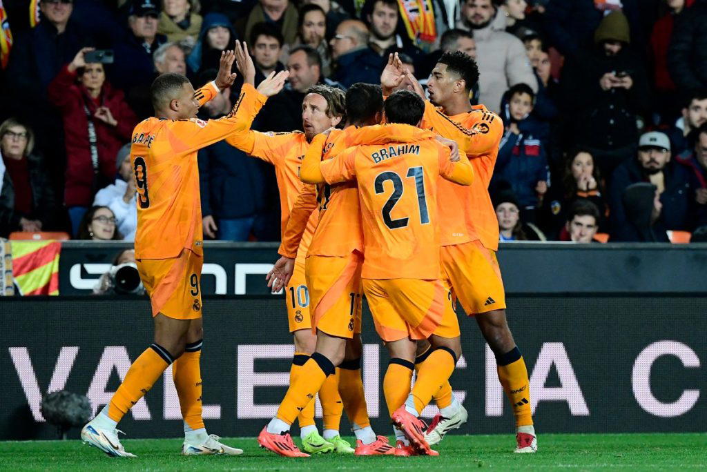 Bellingham grabs Real Madrid late Valencia win after Vinicius red ...